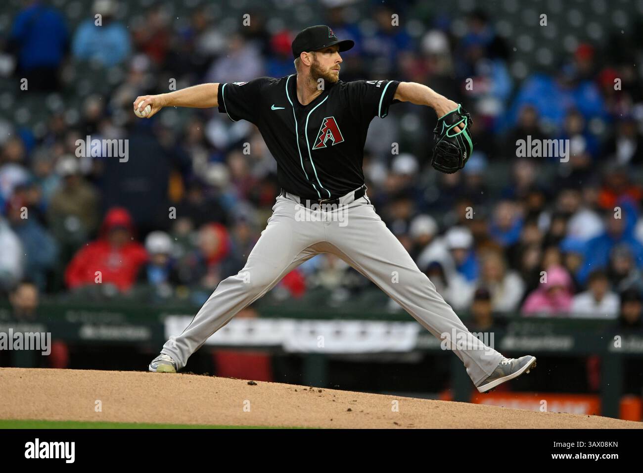 Arizona Diamondbacks starter Merrill Kelly delivers a pitch during the ...