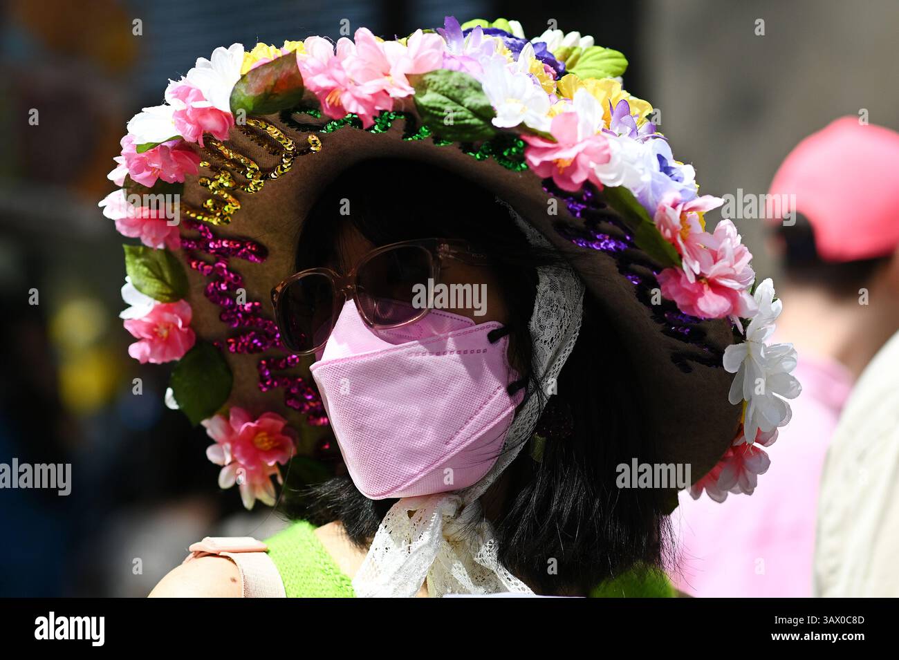 To celebrate Easter parade goers dress in decorative hats and outfits ...