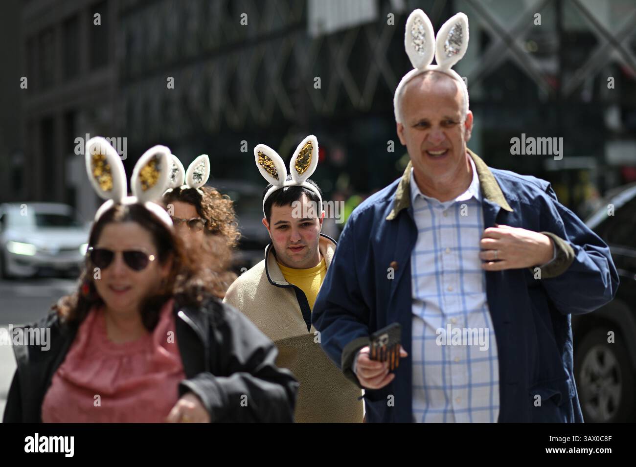 To celebrate Easter parade goers dress in decorative hats and outfits ...