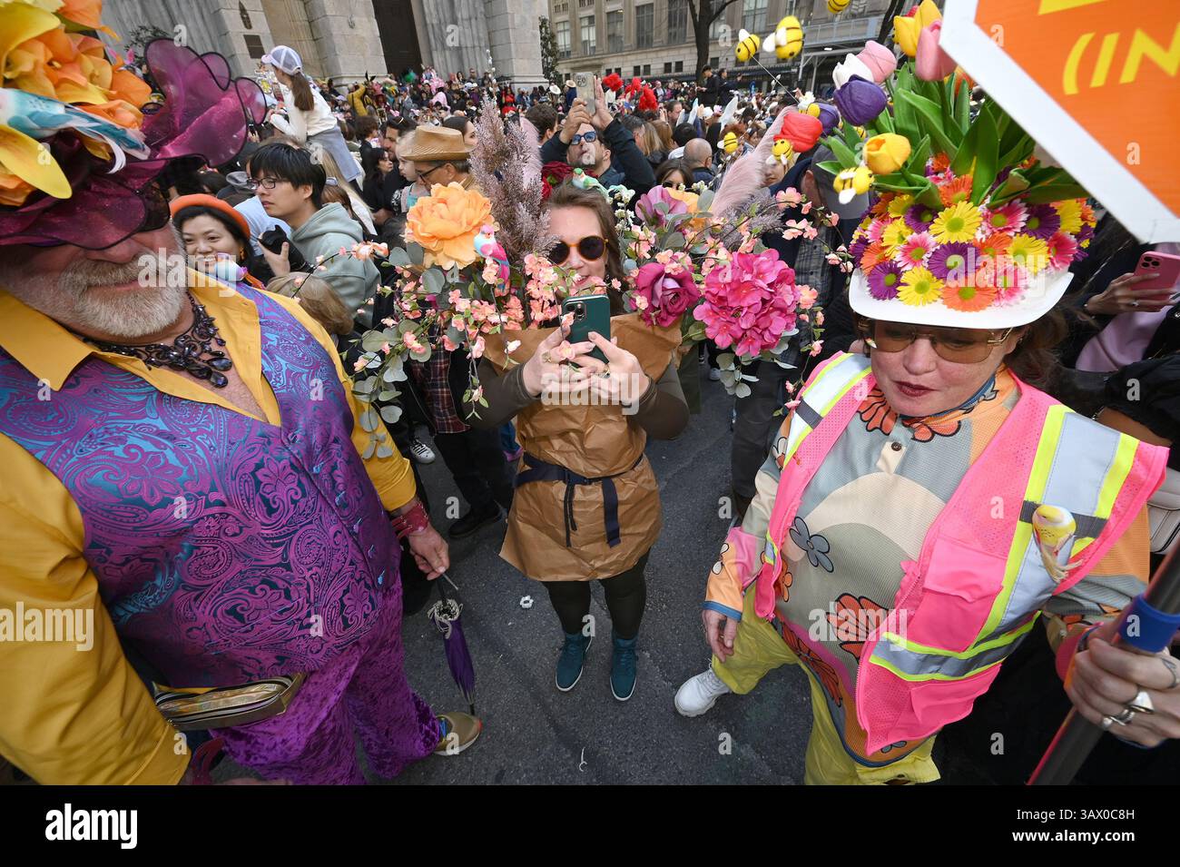 To celebrate Easter parade goers dress in decorative hats and outfits ...