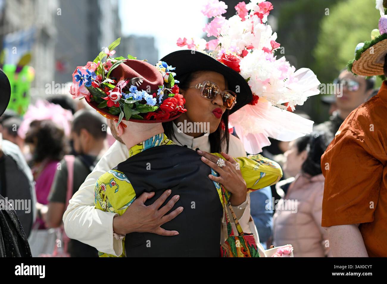 To celebrate Easter parade goers dress in decorative hats and outfits ...