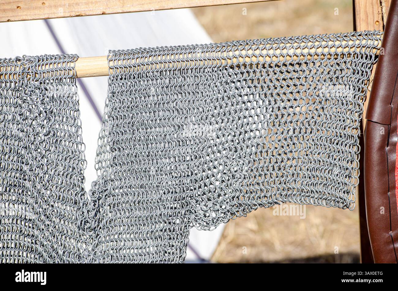 hanging chainmail shirt on a wooden display at a historical recreation ...