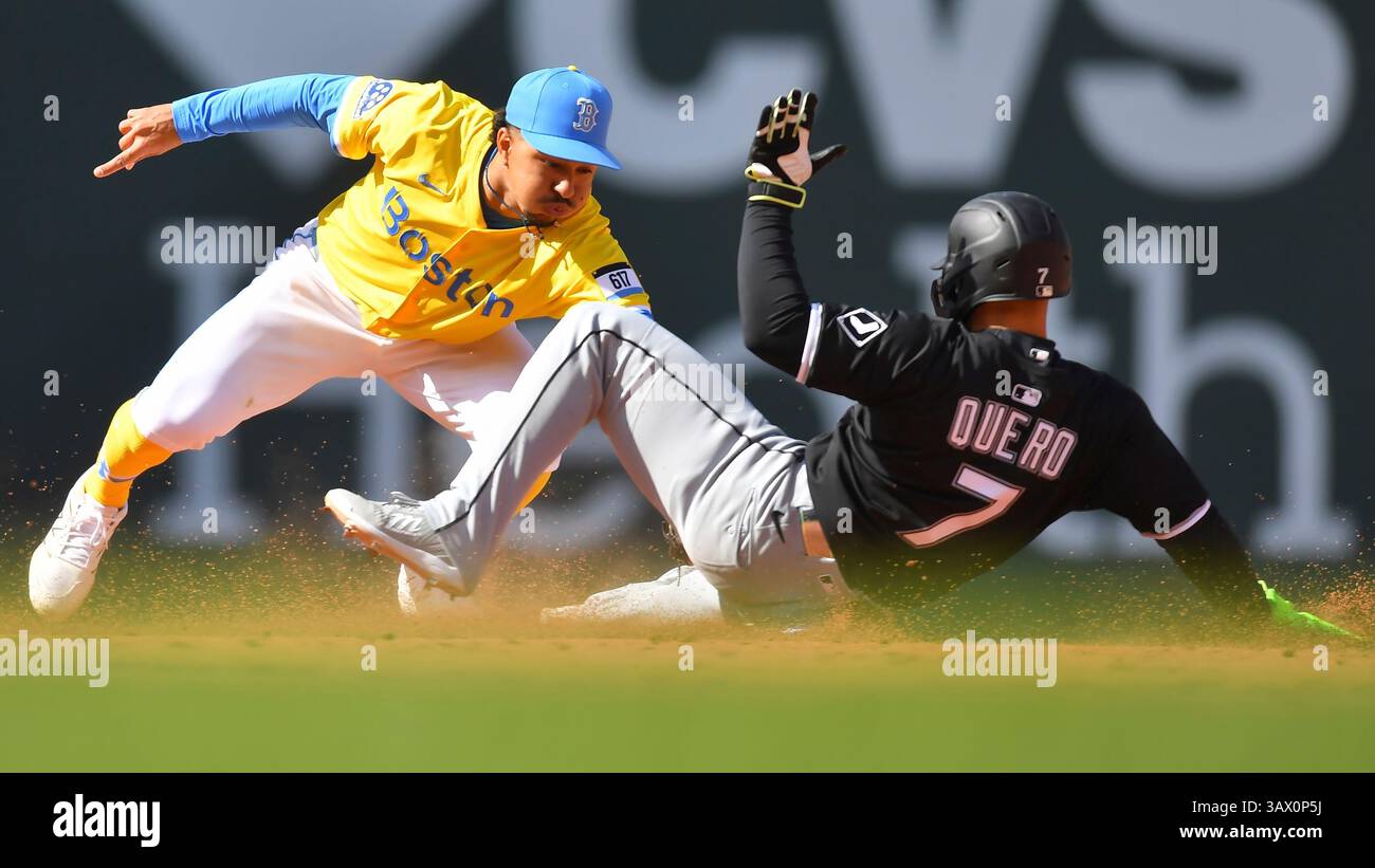 Chicago White Sox's Edgar Quero, right, slides out at second on a ...