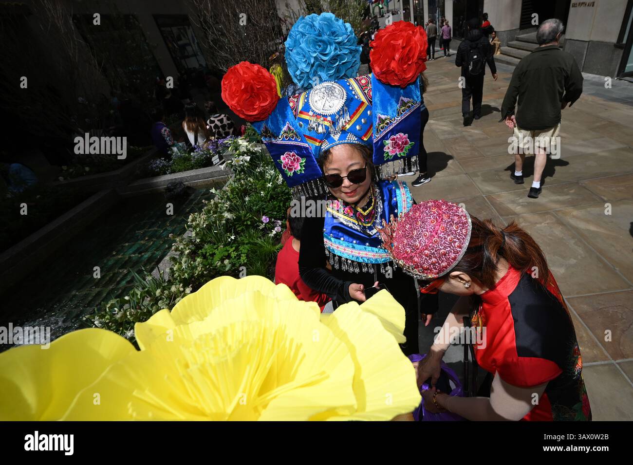 To celebrate Easter parade goers dress in decorative hats and outfits ...