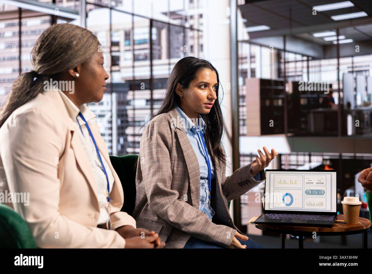 Women leaders strategizing in a corporate office focused on growth ...