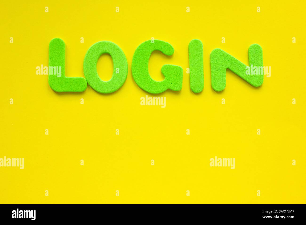 The word LOGIN made with green letters written on a yellow background ...