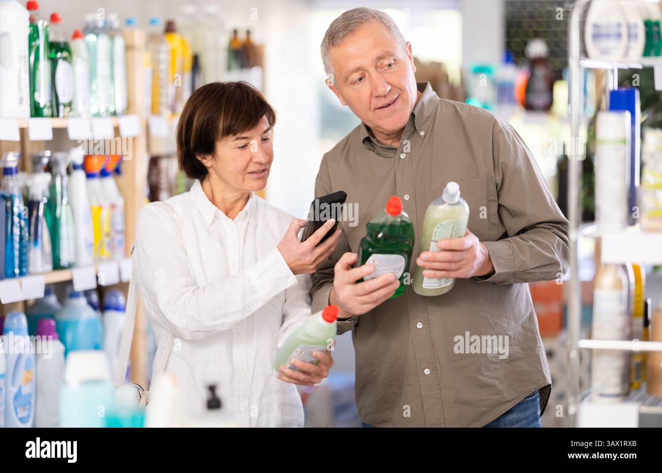Couple man and woman scanning qr code for dishwashing detergent Stock ...