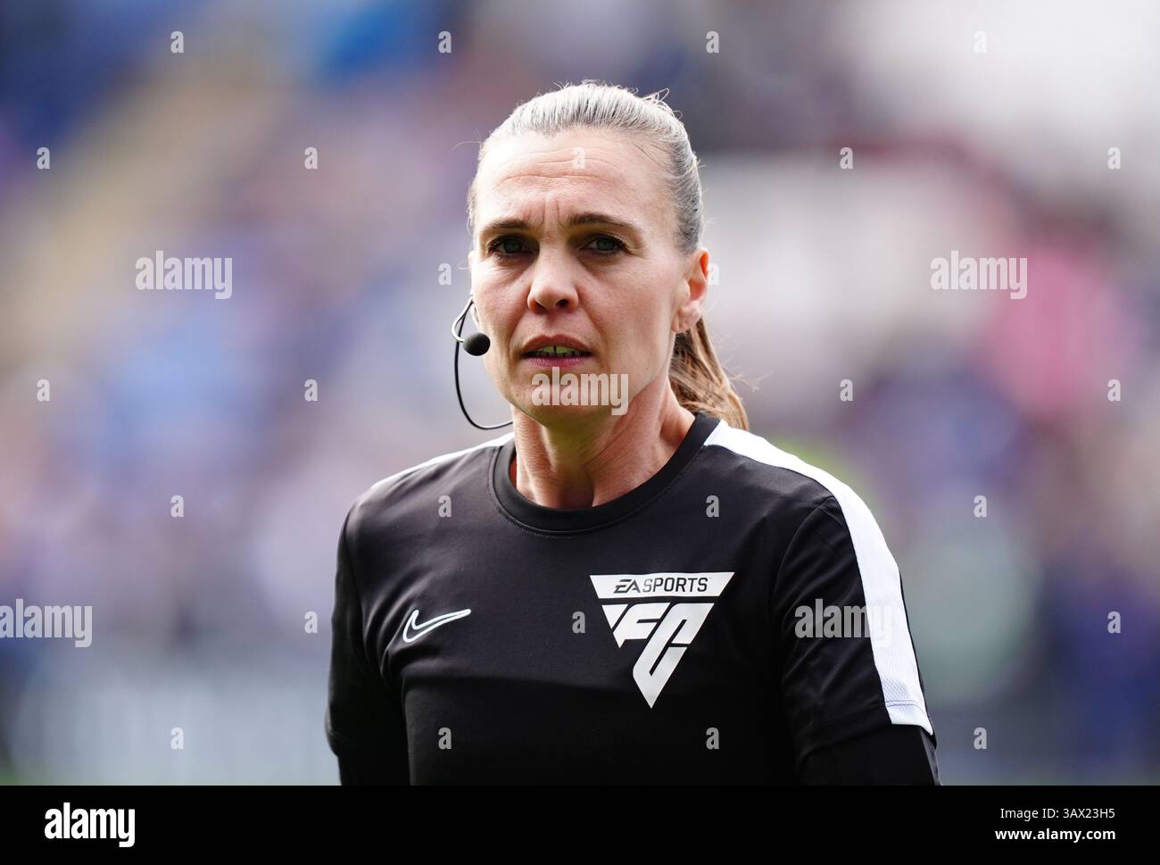 Referee assistant Natalie Aspinall warms up before during the Premier ...