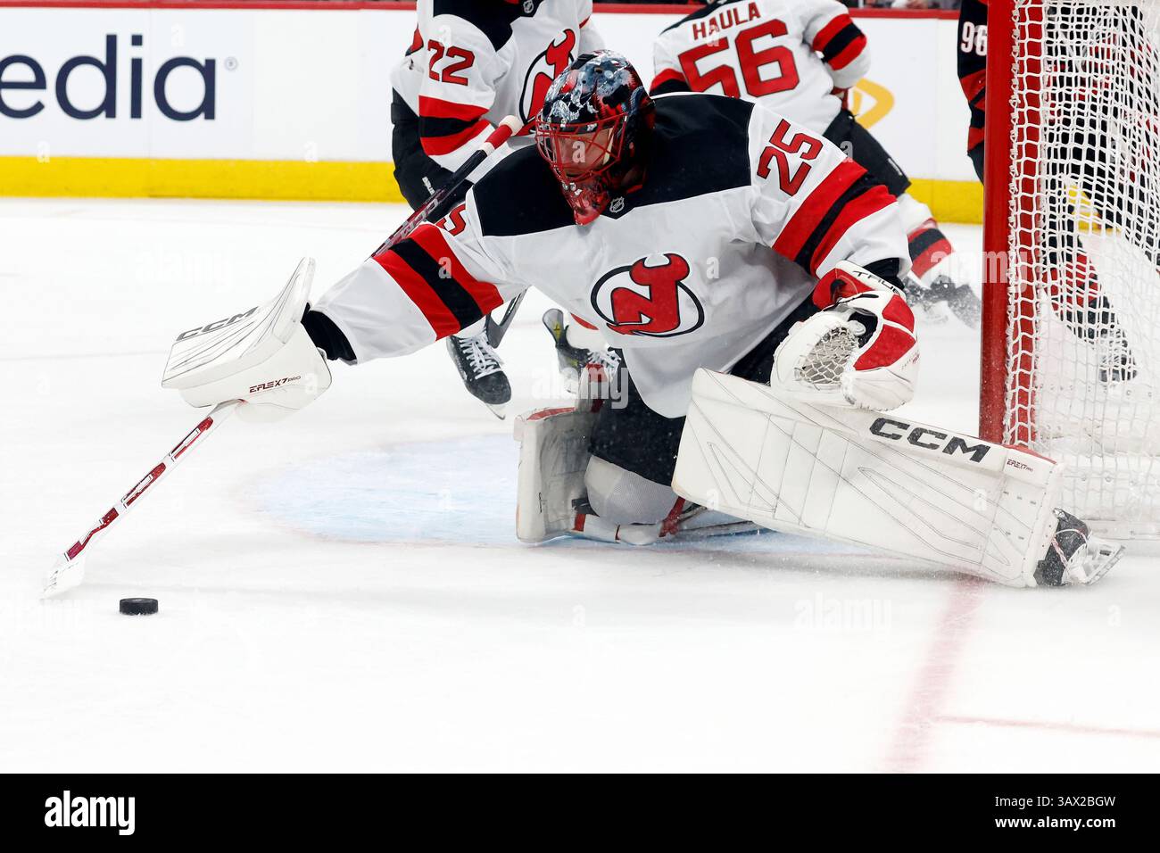 New Jersey Devils goaltender Jacob Markstrom (25) gathers in the puck ...