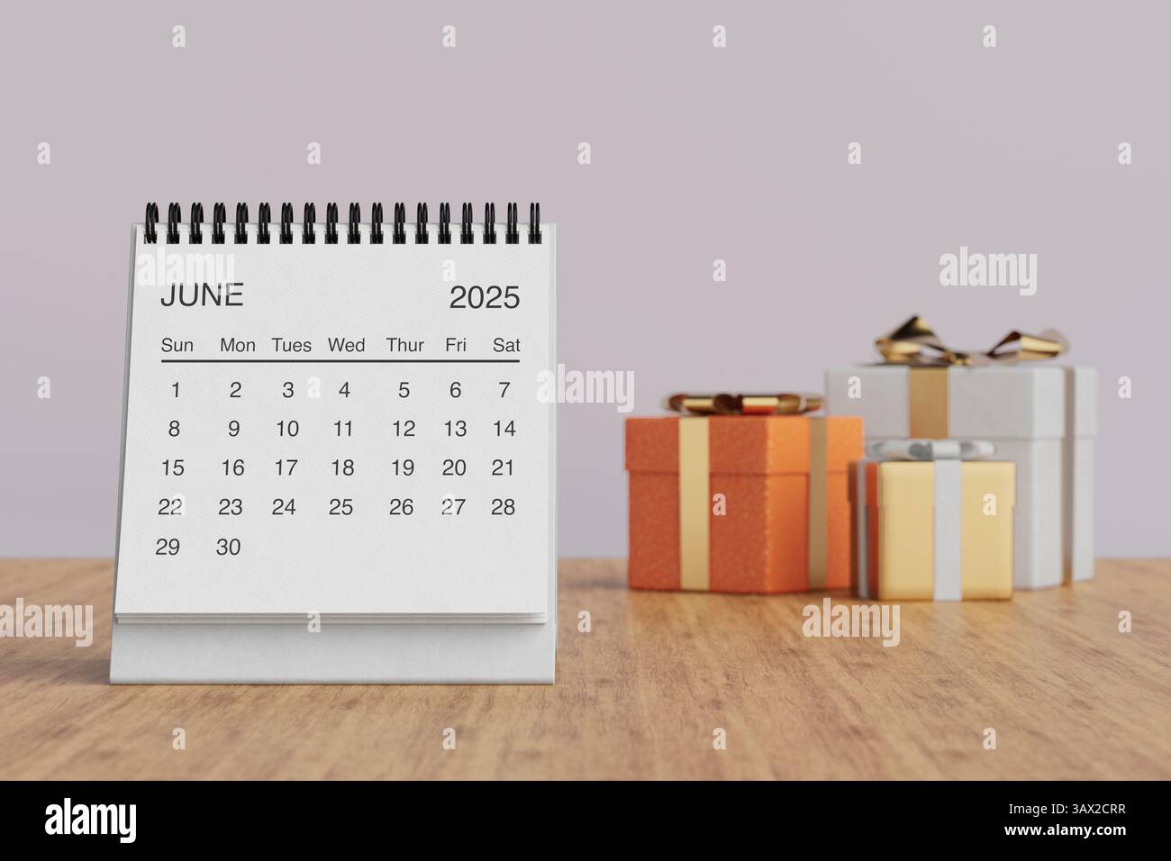 White Desk Monthly June 2025 Business Calendar Near Gift Boxes on a ...