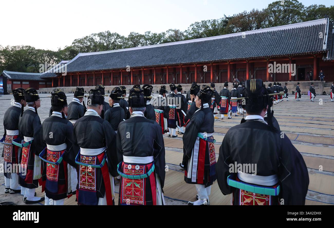 21st Apr, 2025. Renovated main hall of Jongmyo Shrine People dressed in ...