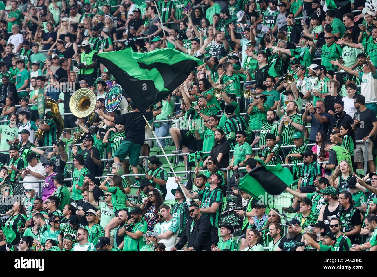 AUSTIN, TX - APRIL 19: Austin FC supporters' section waives flags and ...