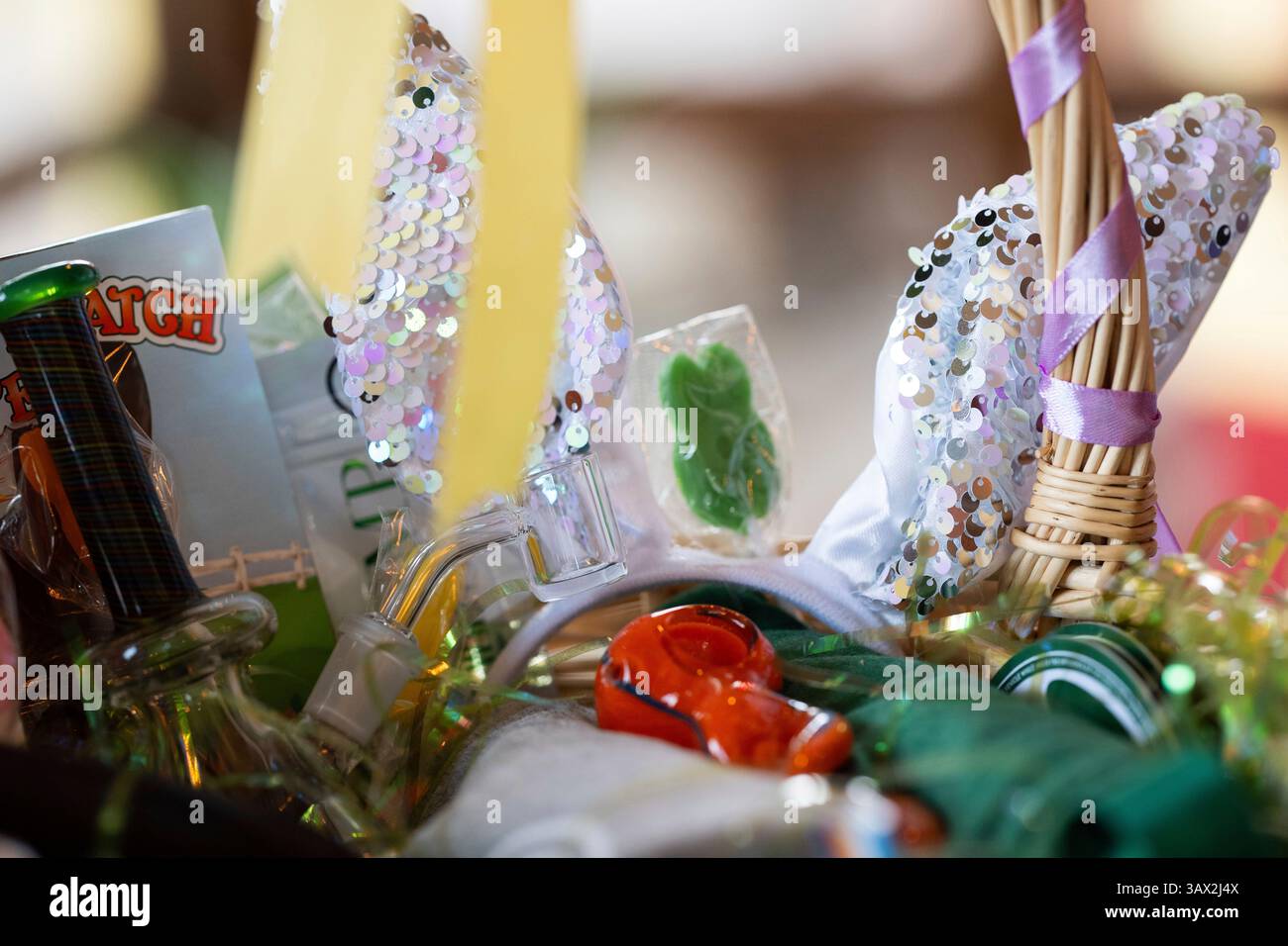 A glass pipe is seen in an Easter giveaway basket during a "blaze and ...