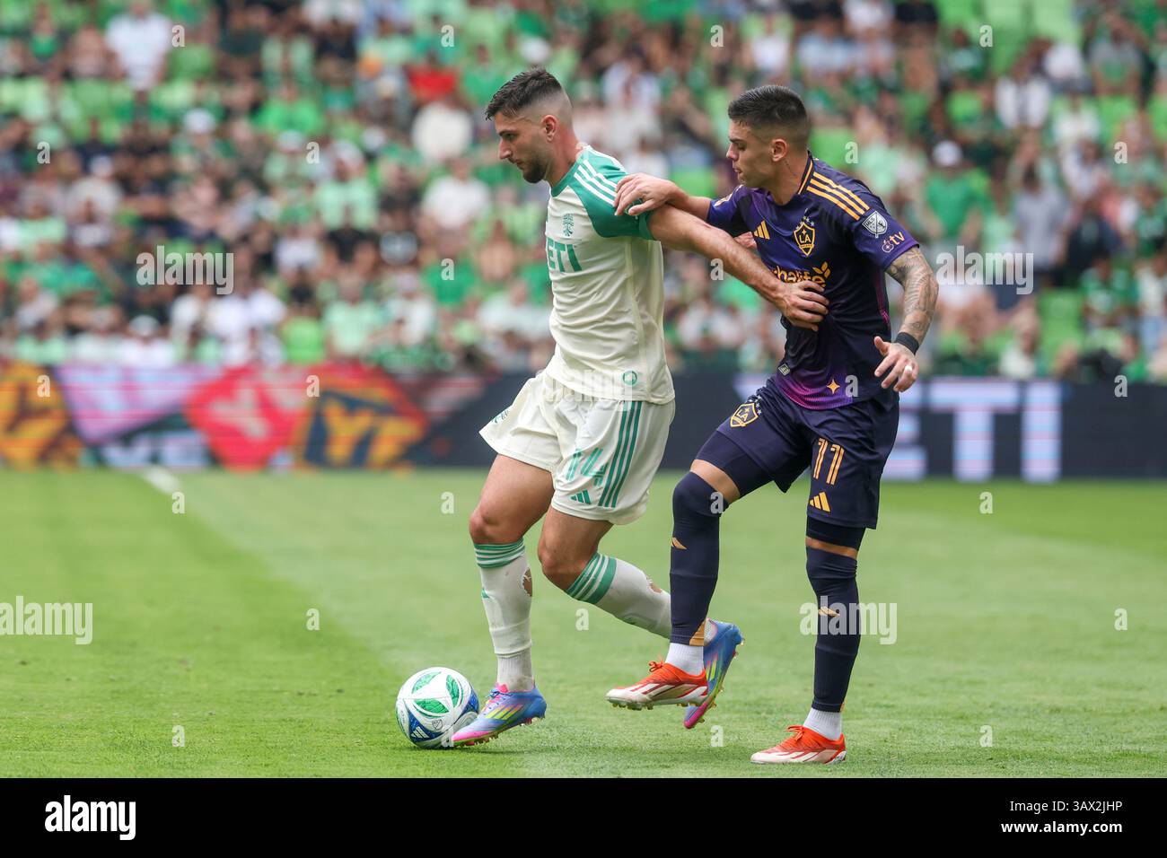 AUSTIN, TX - APRIL 19: Austin FC midfielder Besard Sabović (14) and Los ...