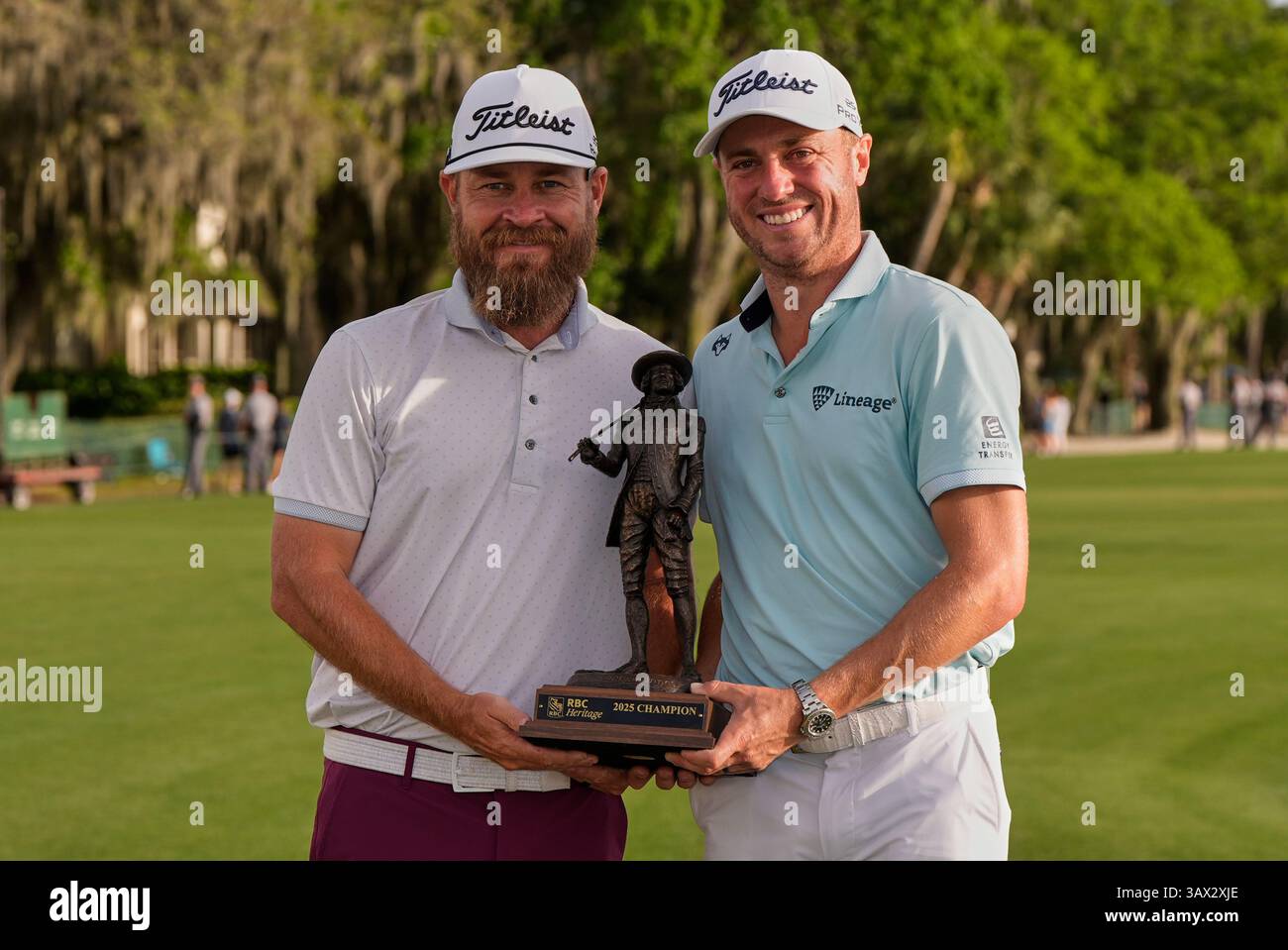 Justin Thomas, right, poses with his caddie Joe Greiner, left, after ...