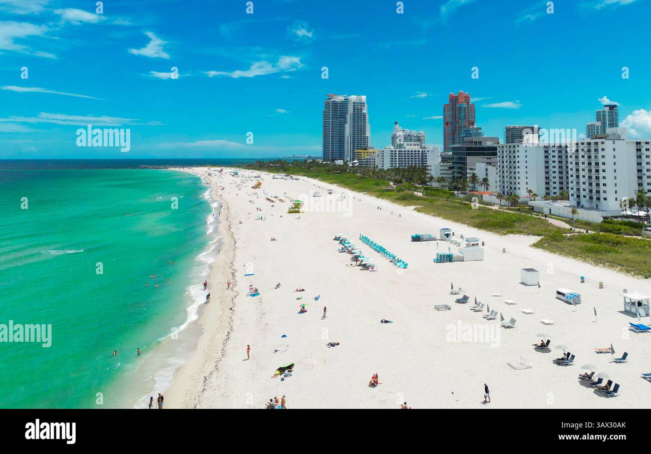 Miami cityscape with luxury skyscrapers and ocean. Panoramic drone view ...