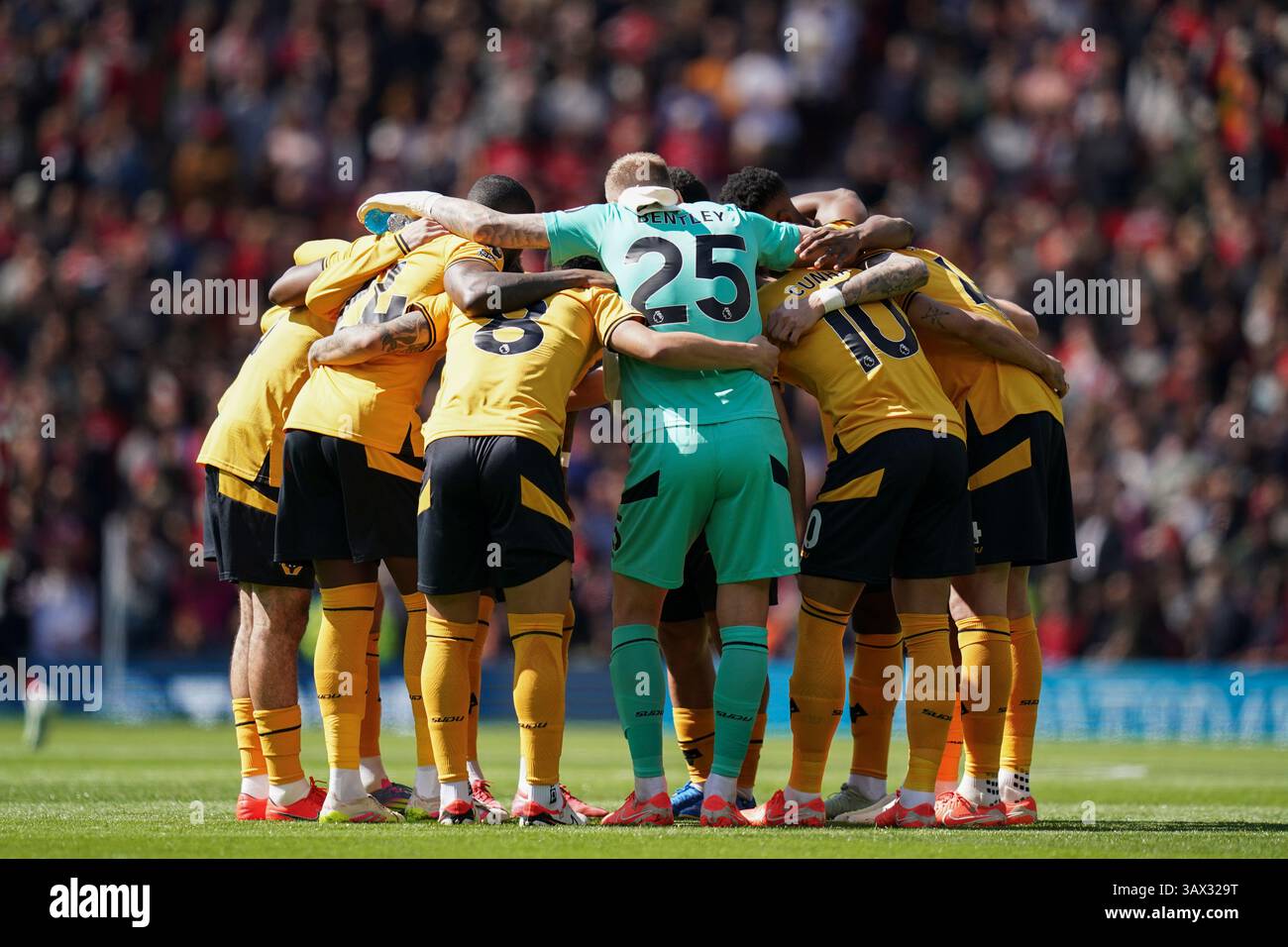 Manchester, UK. 20th Apr, 2025. Wolves players huddle Wolverhampton ...