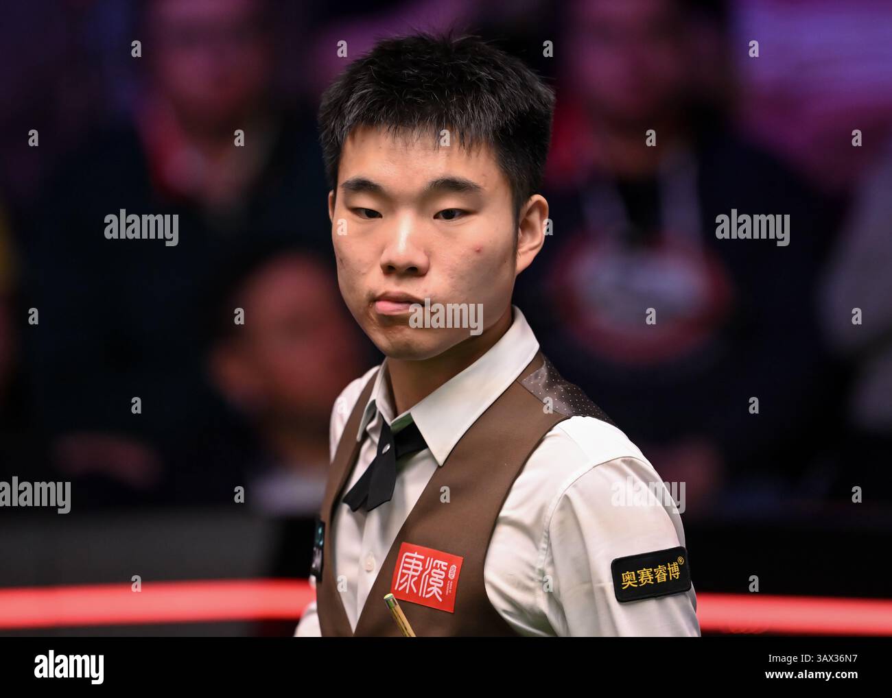 Sheffield, England, 20th April 2025. Fan Zhengyi reacts during his ...
