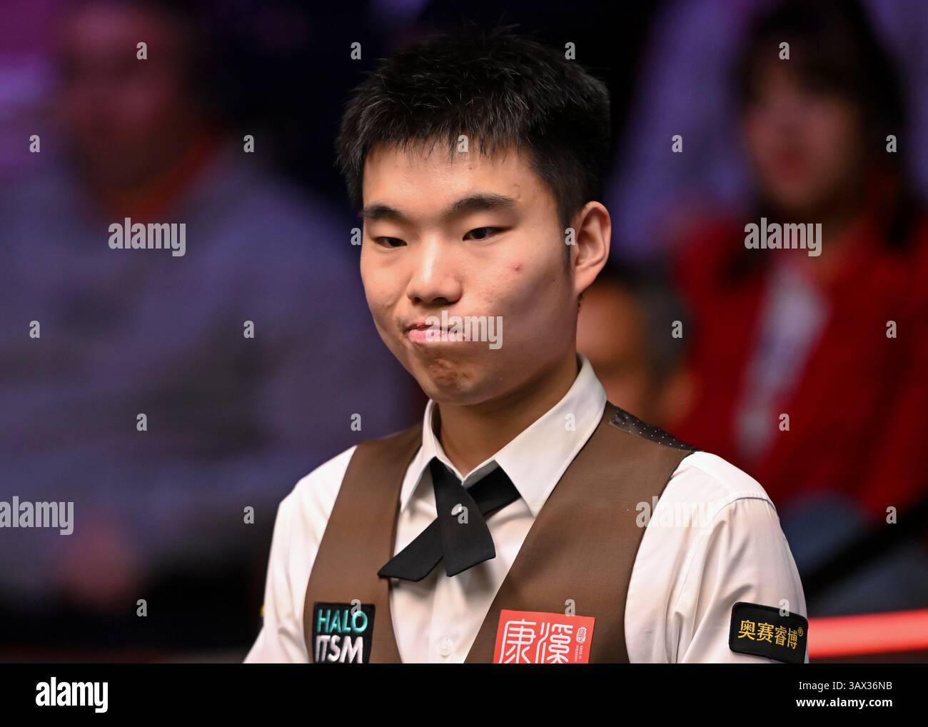 Sheffield, England, 20th April 2025. Fan Zhengyi reacts during his ...