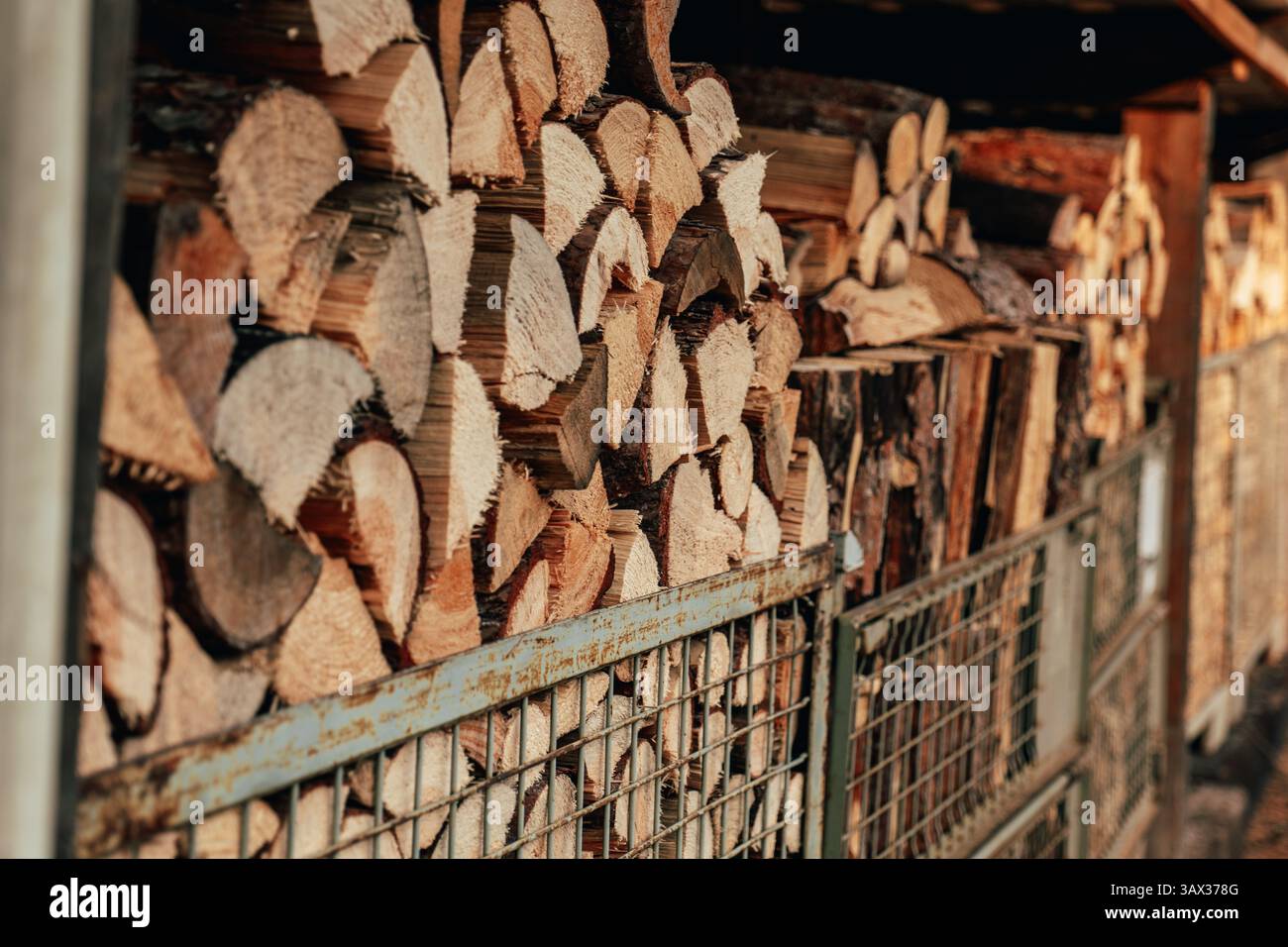 Wood heating.Stacked Firewood Storage Bins.Stacked Firewood Pile Stock ...