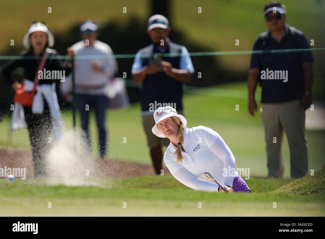 Ingrid Lindblad hits from the bunker on the sixth hole during the final ...