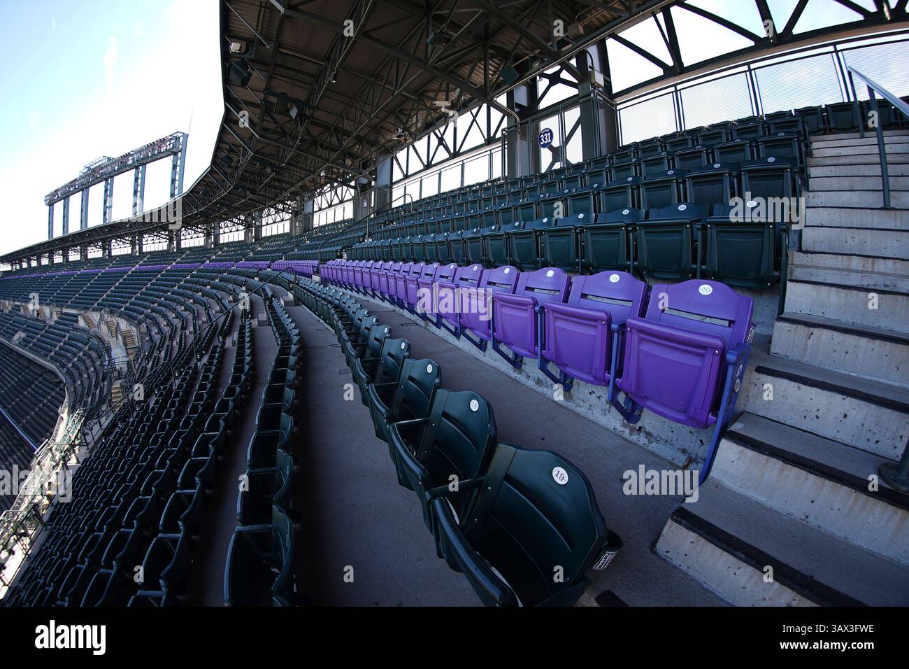 As viewed through a fisheye lens, the row of purple seats in the upper deck mark the elevation ...