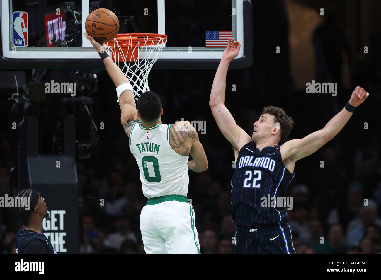 Boston Celtics' Jayson Tatum (0) shoots against Orlando Magic's Franz ...