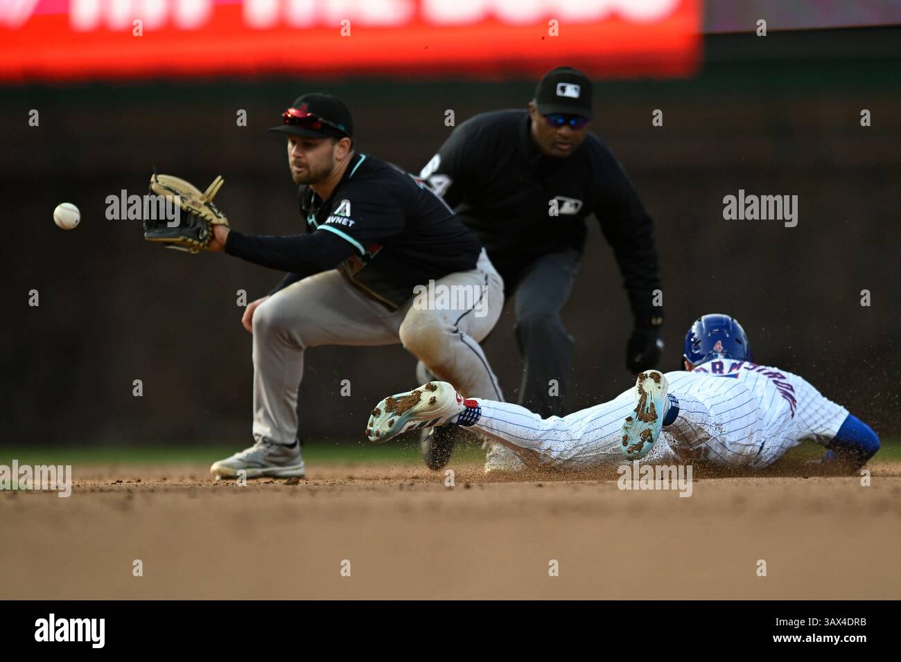 Chicago Cubs' Pete Crow-Armstrong (4) steals second base while Arizona ...