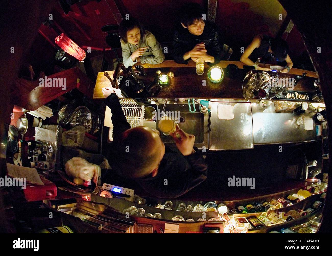 Manager Masatoshi Shibata serves drinks at Albatross Bar in ...