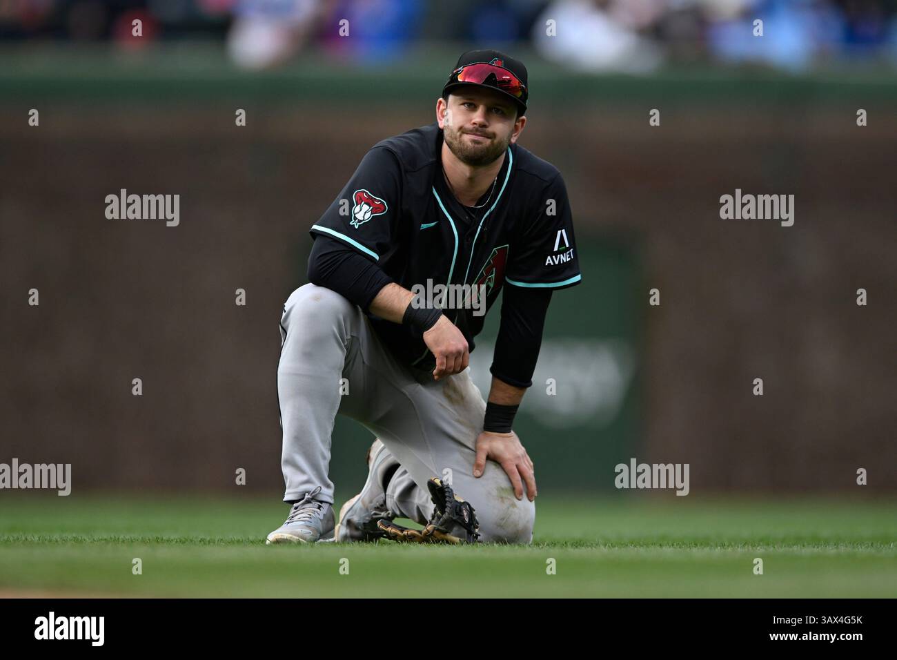 Arizona Diamondbacks' Tim Tawa reacts after committing a throwing error ...