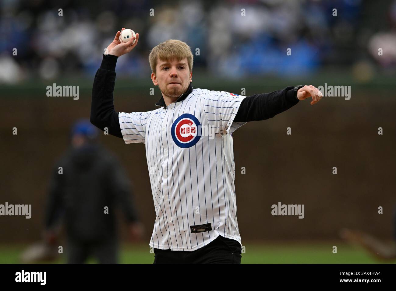 Indy car driver Robert Shwartzman throws out the ceremonial first pitch ...