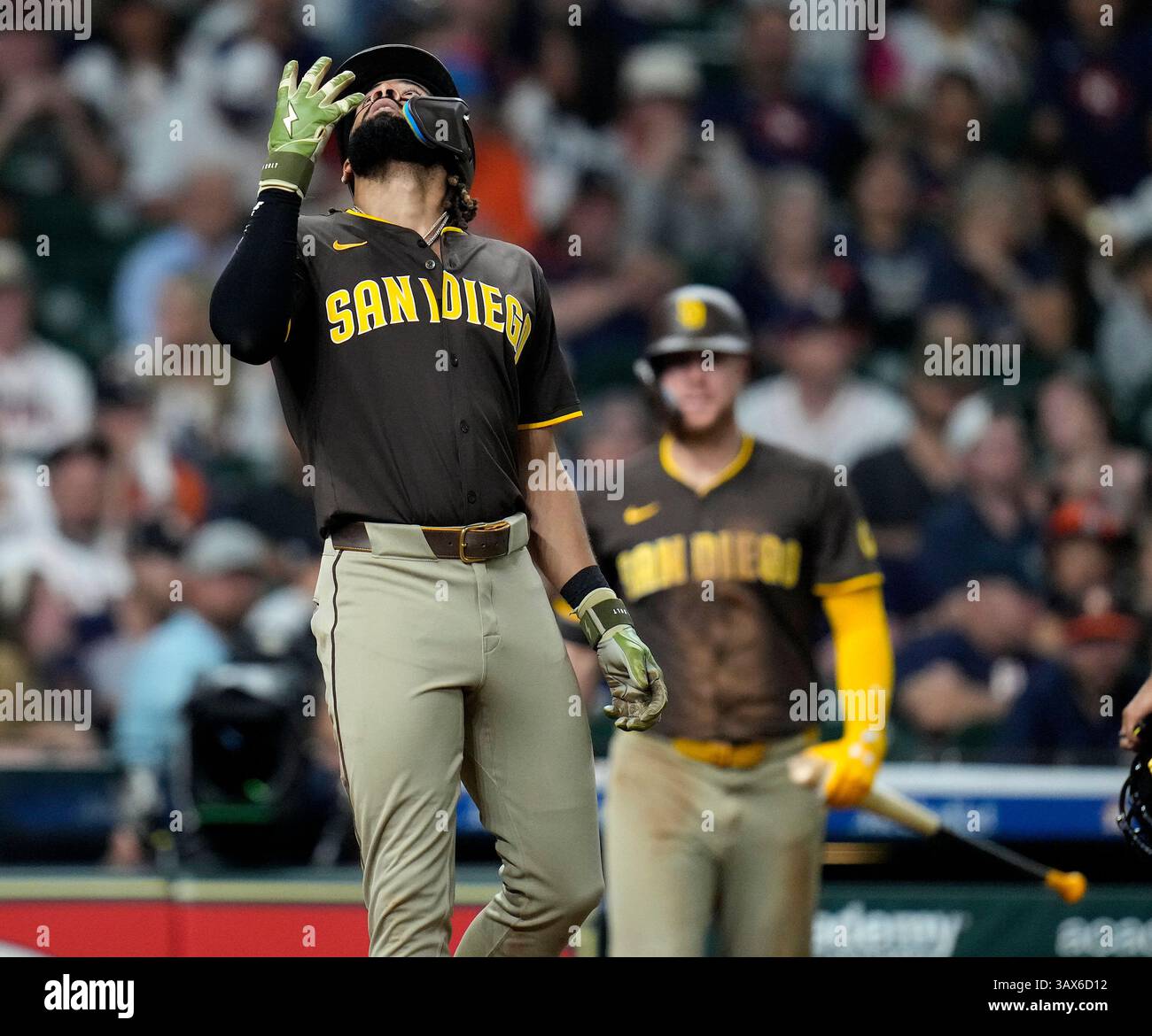 San Diego Padres' Fernando Tatis Jr. reacts after his home run against ...