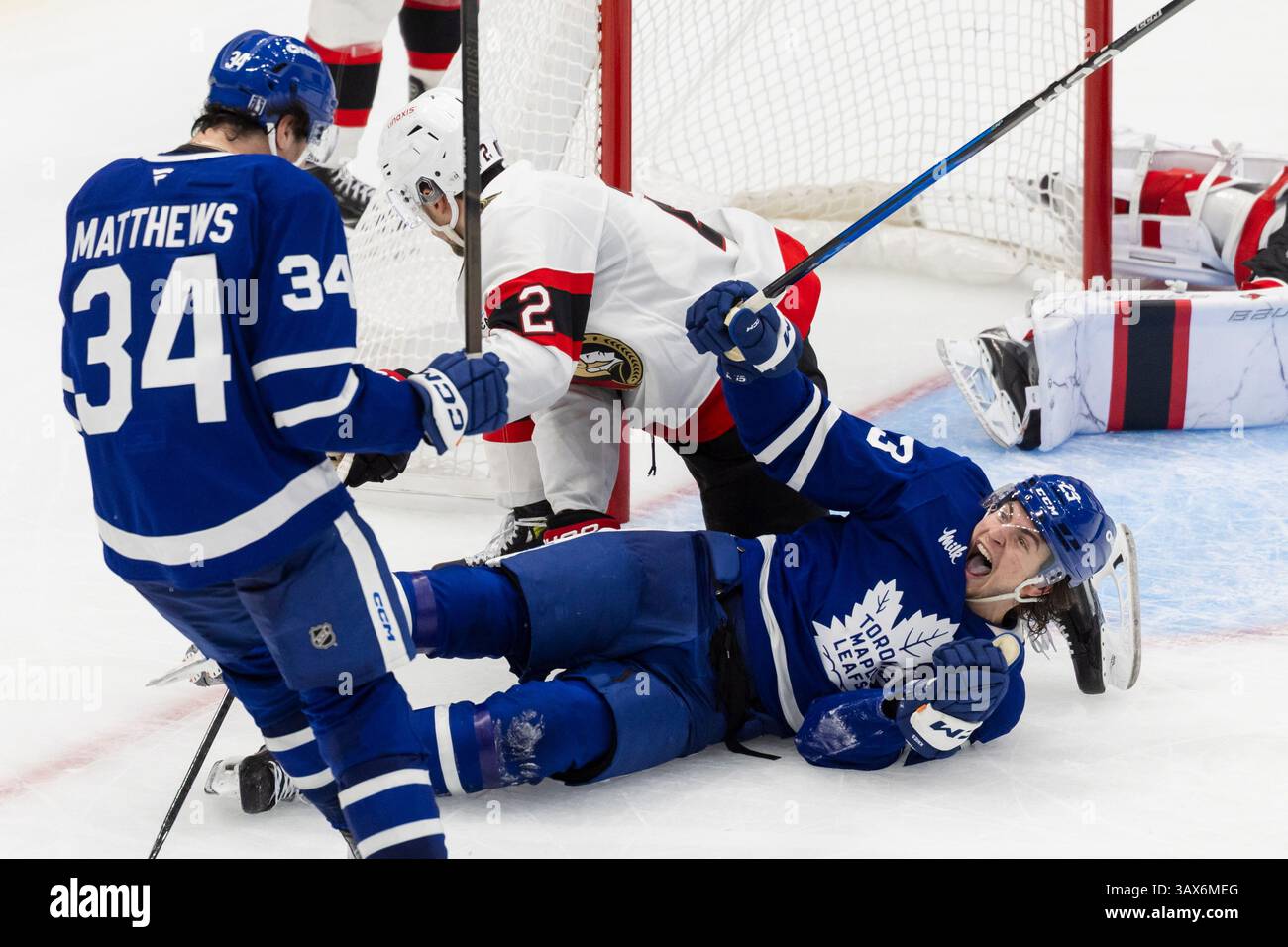 Toronto Maple Leafs‚ teammates Matthew Knies (23) and Auston Matthews ...