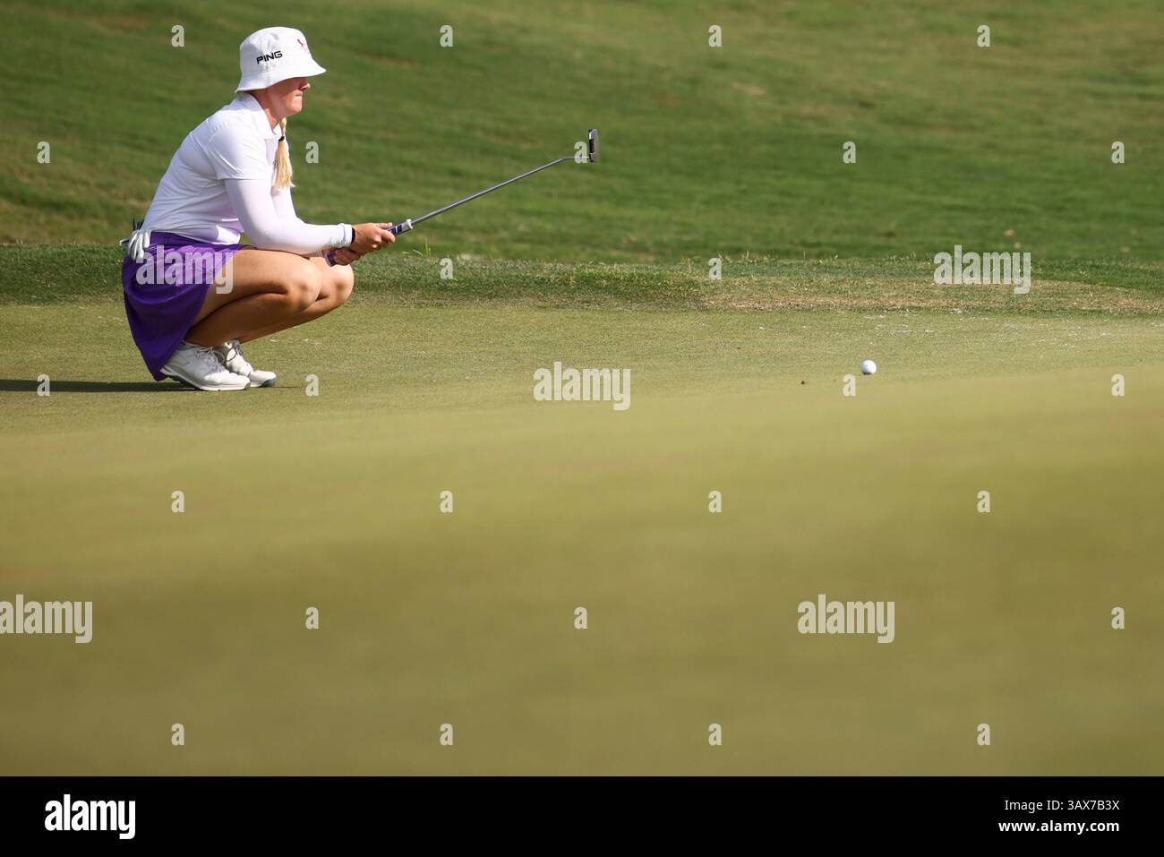 Ingrid Lindblad lines up her putt on the fifteenth green during the ...