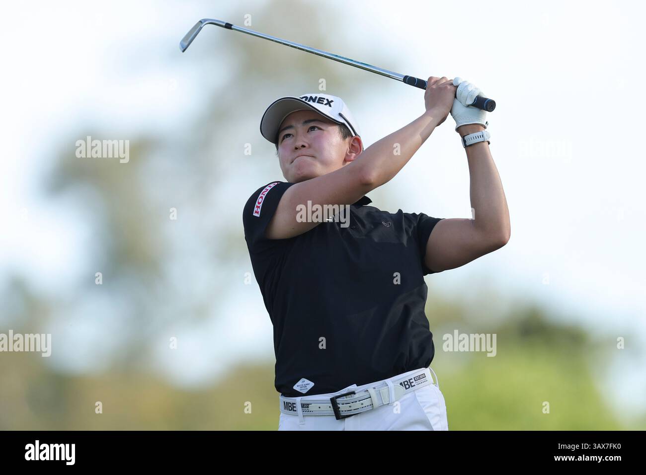 Akie Iwai of Japan hits from the seventeenth tee during the final round ...