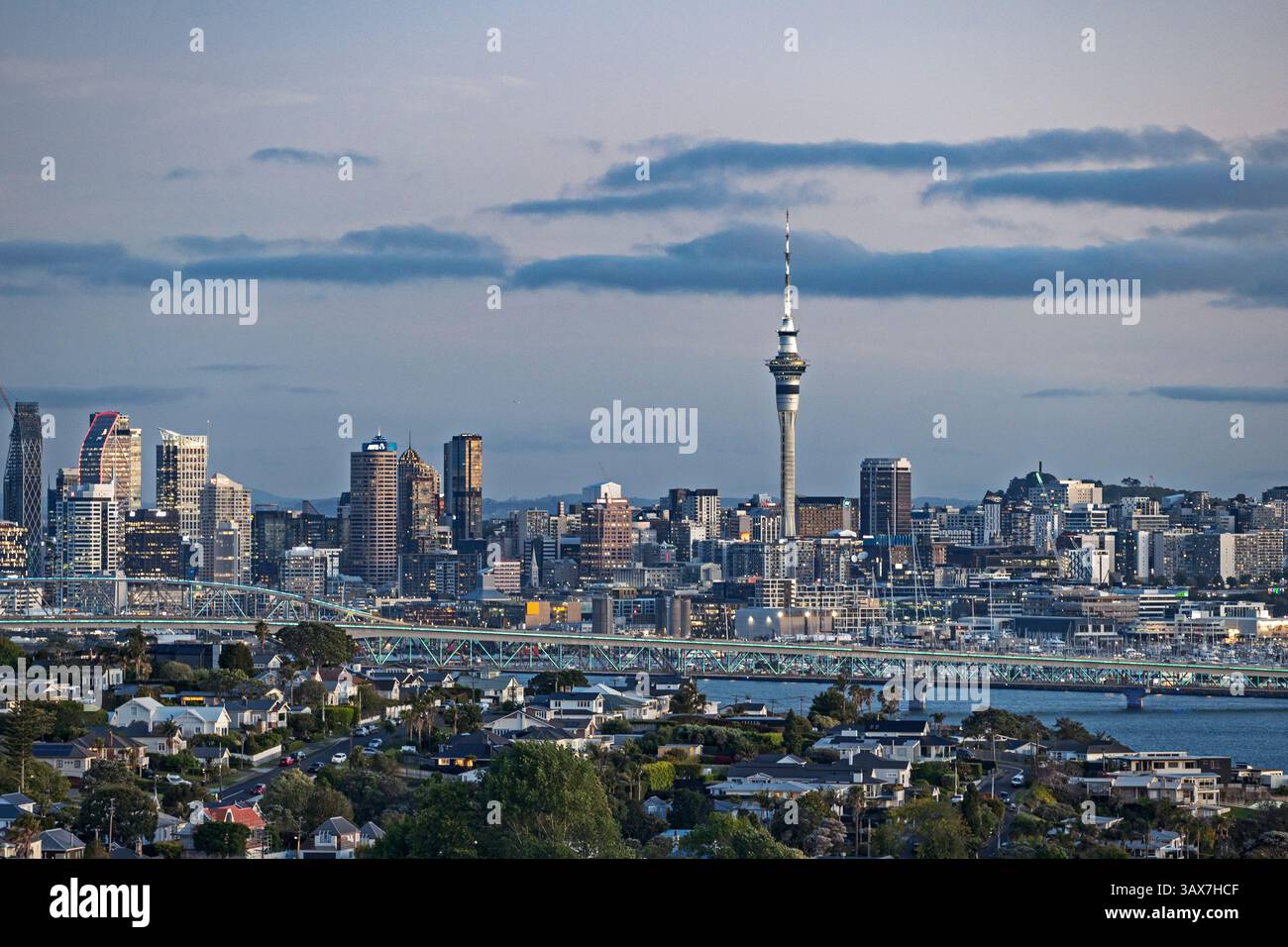 Auckland's skyline showcases tall buildings with the iconic Sky Tower ...