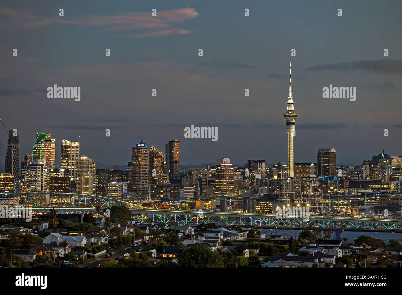 Auckland's skyline showcases tall buildings with the iconic Sky Tower ...