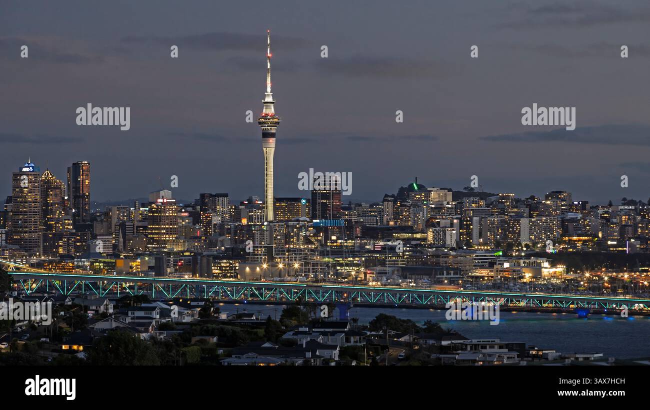 Auckland's skyline showcases tall buildings with the iconic Sky Tower ...