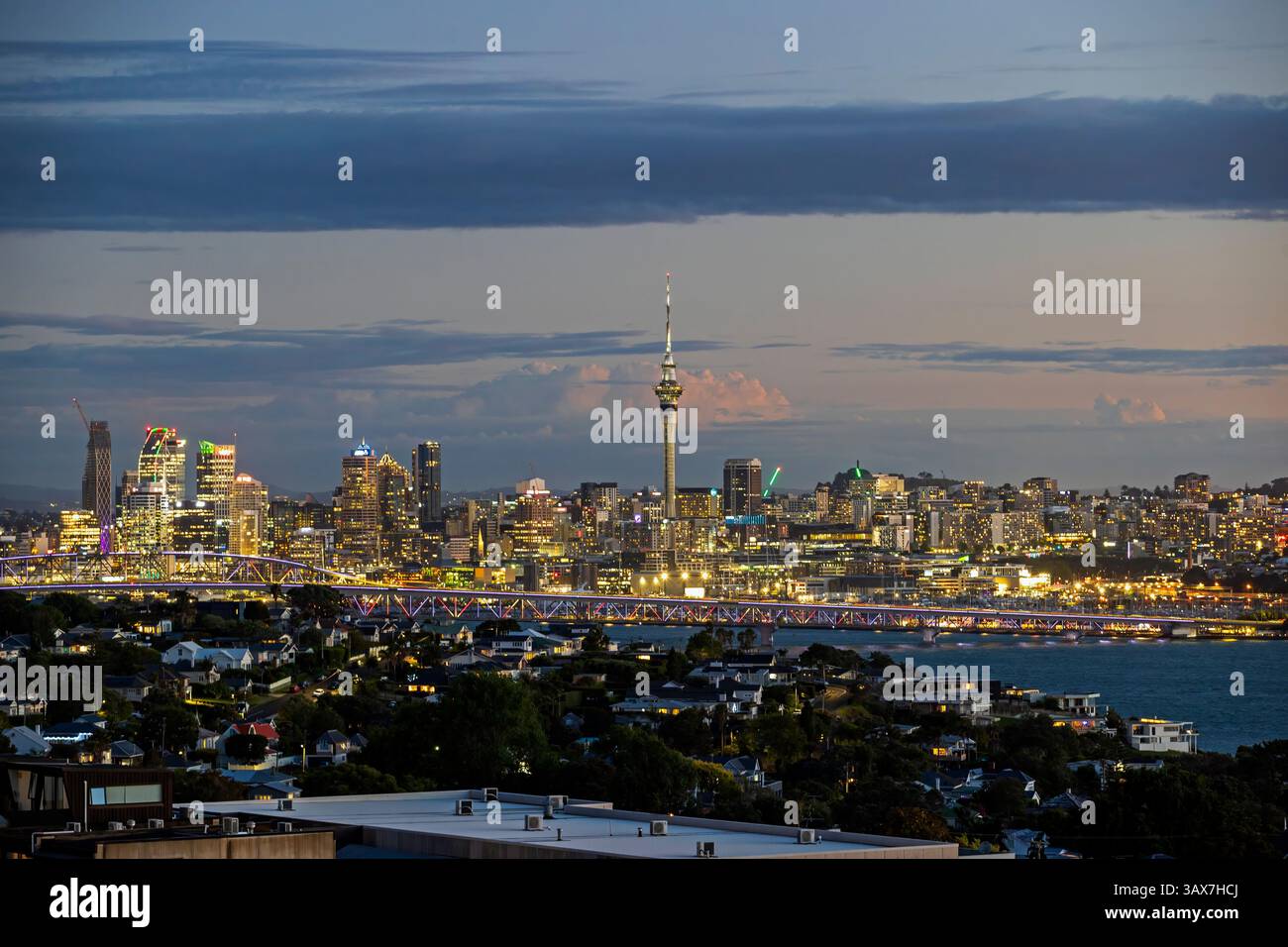 Auckland's skyline showcases tall buildings with the iconic Sky Tower ...