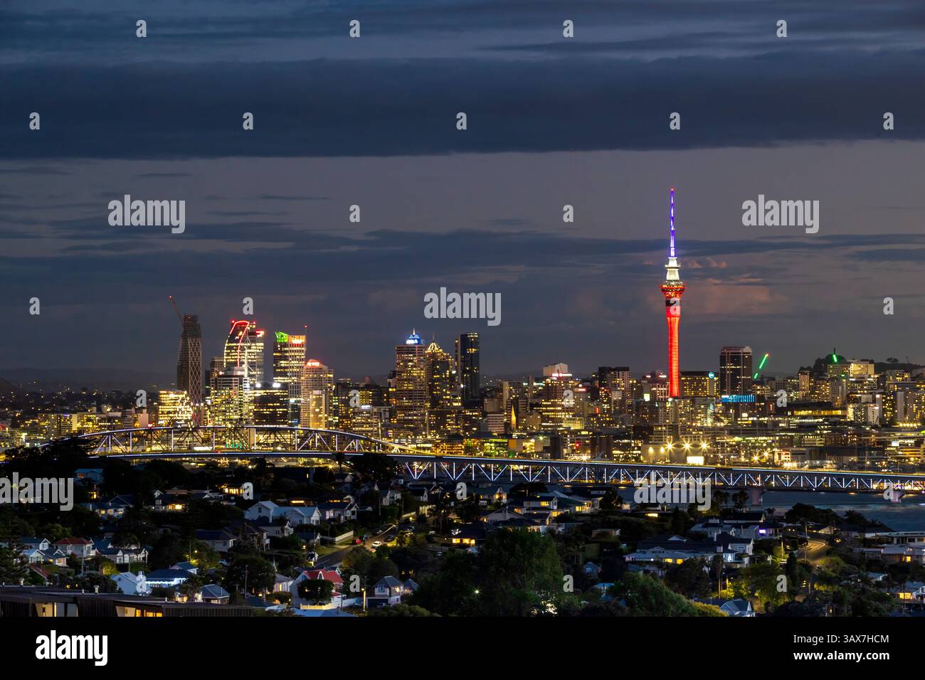 Auckland's skyline showcases tall buildings with the iconic Sky Tower ...