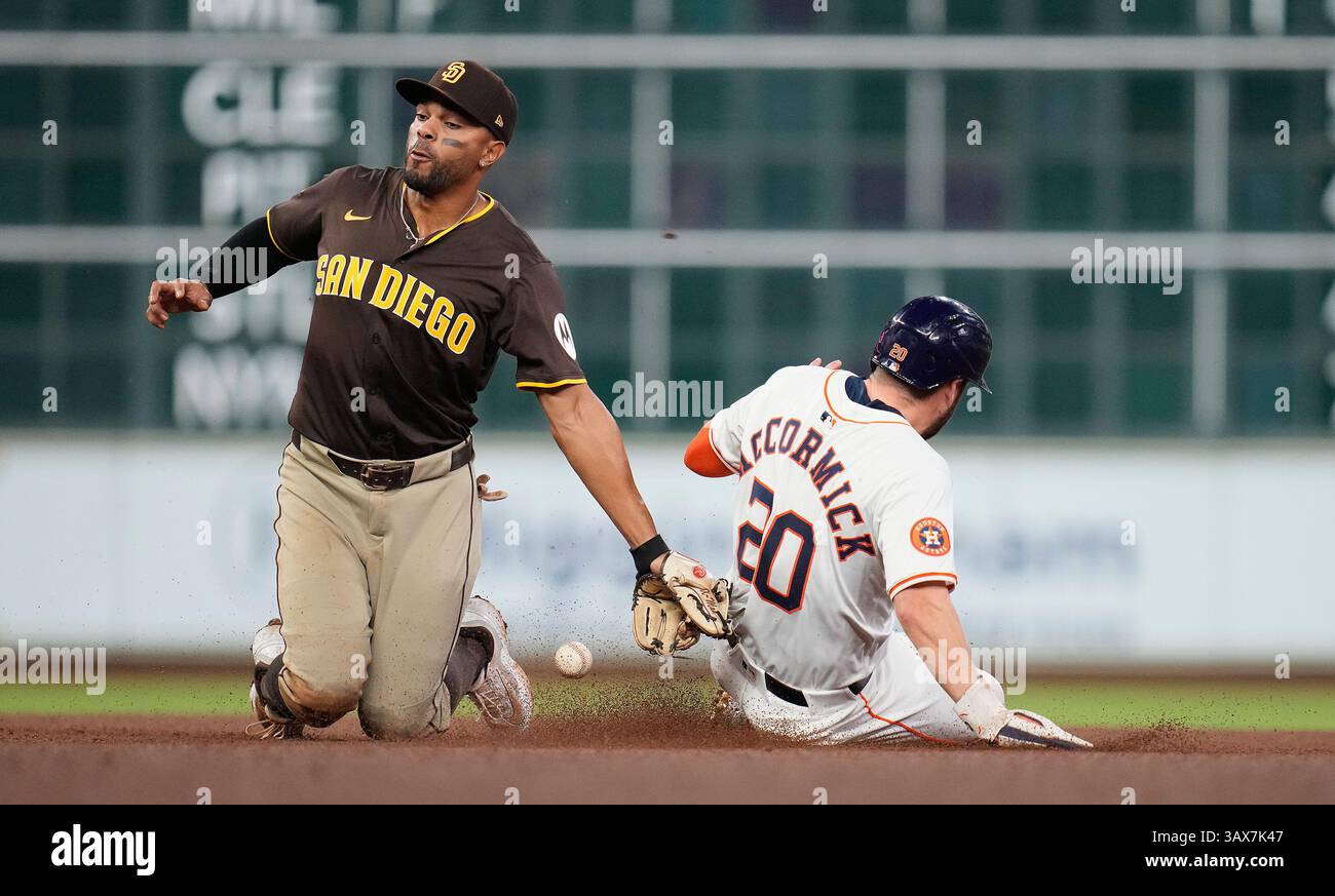 Houston Astro's Chas McCormick (20) steals second base against San ...