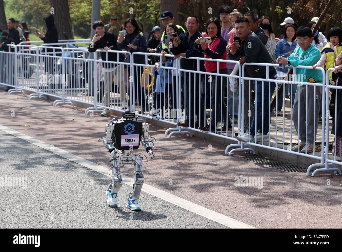 The world's first humanoid robot half-marathon kicks off in Beijing ...