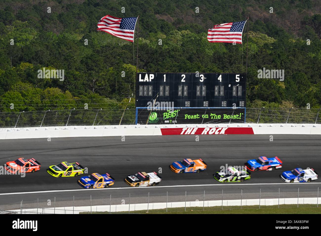 Rockingham, North Carolina, USA. 18th Apr, 2025. Cars run through turn ...