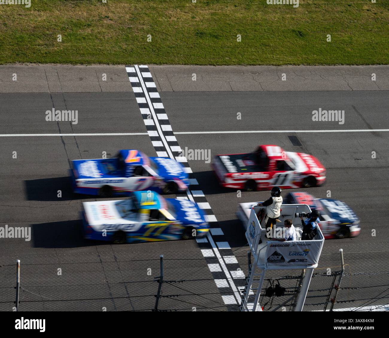 Rockingham, North Carolina, USA. 18th Apr, 2025. Cars pass the start ...