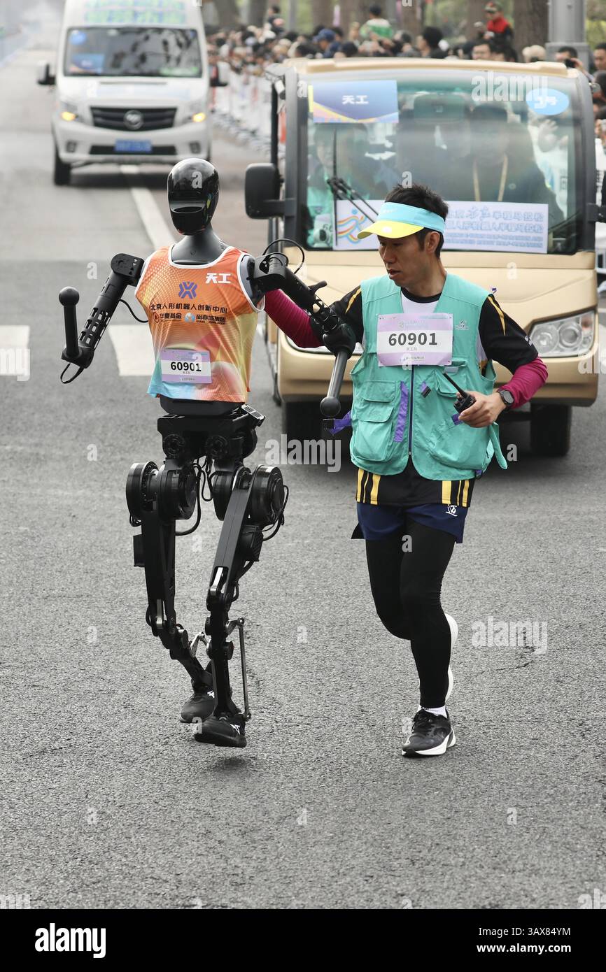 The world's first humanoid robot half-marathon kicks off in Beijing ...