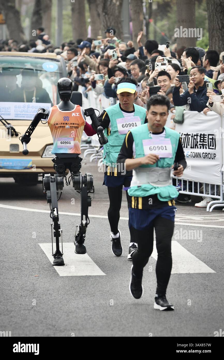 The world's first humanoid robot half-marathon kicks off in Beijing ...