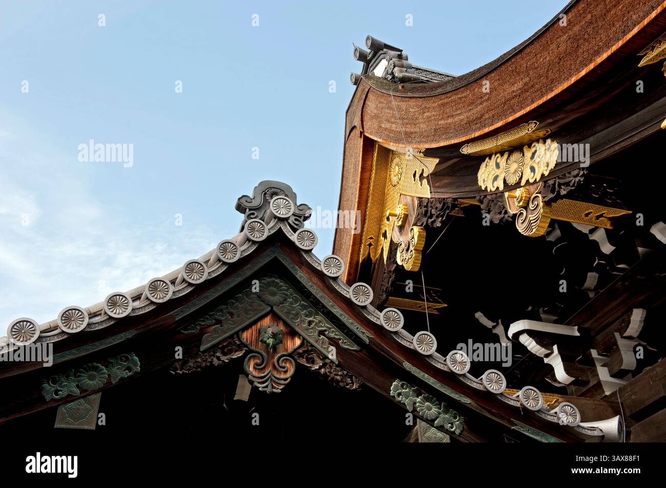 Roof detail showing a kawara style tile roof and a layered cedar bark ...
