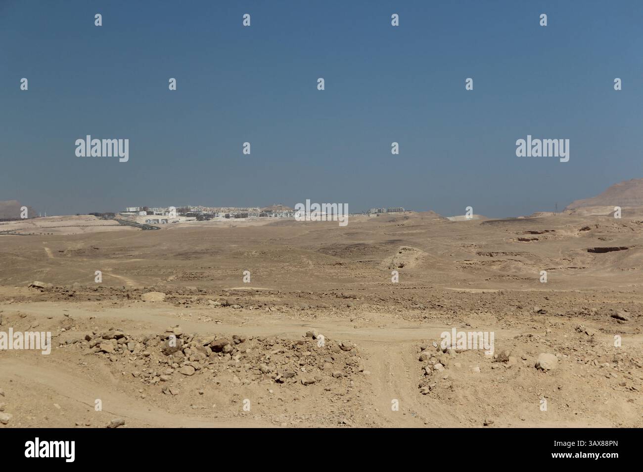 Desert scenery and road sign of Al Galala City on the road trip from ...