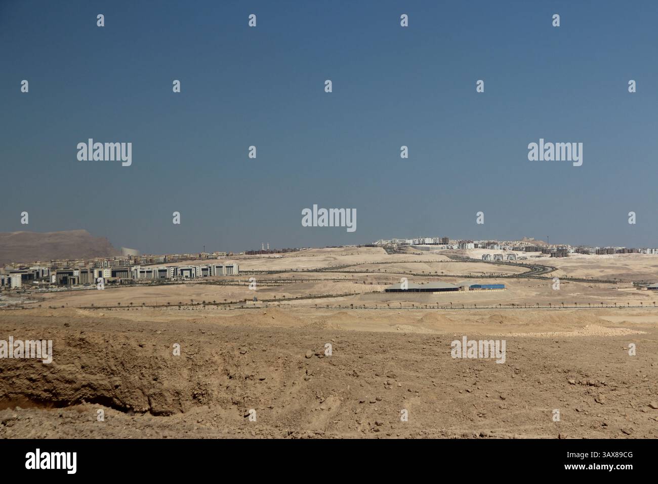 Desert scenery and road sign of Al Galala City on the road trip from ...