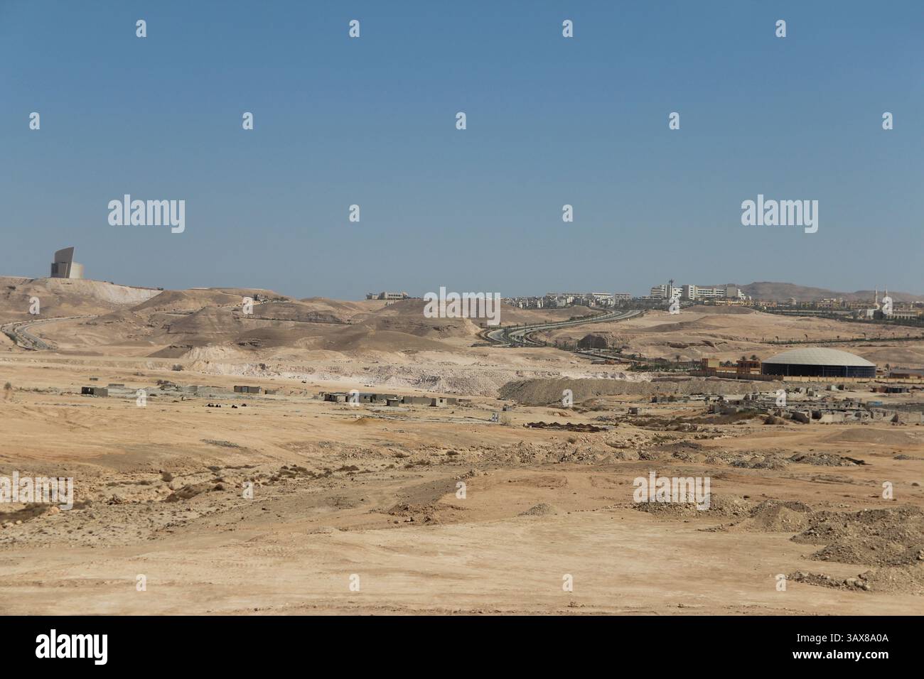 Desert scenery and road sign of Al Galala City on the road trip from ...
